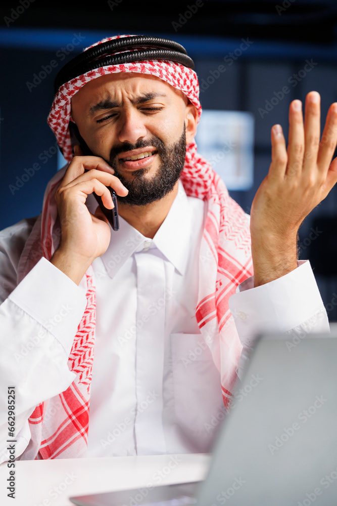 Close-up shot of a Middle Eastern man wearing traditional Islamic ...