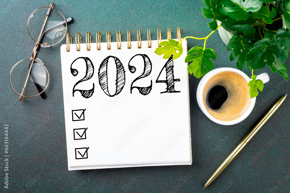 New year resolutions 2024 on desk. 2024 resolutions list with notebook ... New year resolutions 2024 on desk. 2024 resolutions list with notebook ...