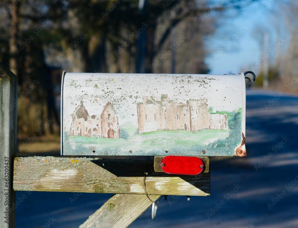 Antique wooden rural mailbox with a hand-painted watercolor ...