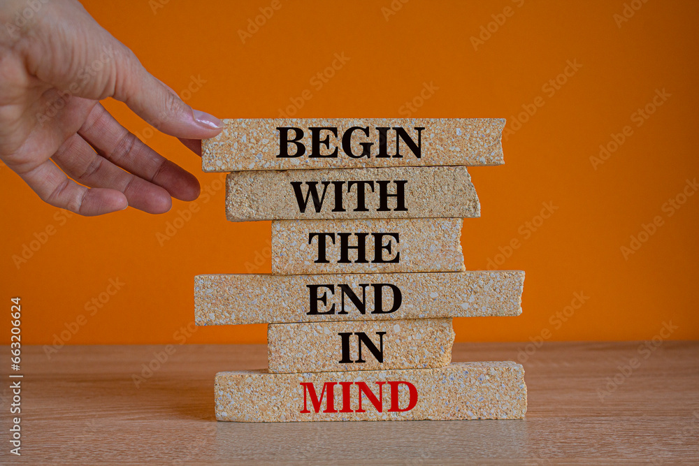 Concept red words Begin with the end in mind on brick blocks. Beautiful ...
