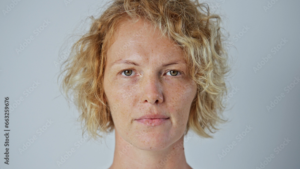 Beautiful person look at camera close up. Young adult woman face ...