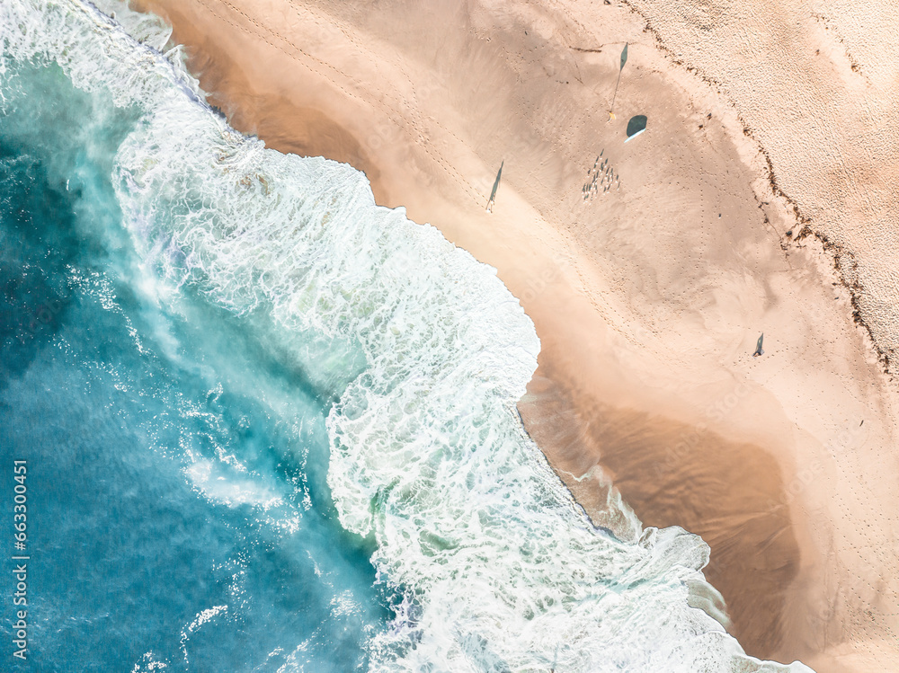 Aerial Top Down View Of Blue Ocean Waves Breaking Onto Sand At Bronte ...