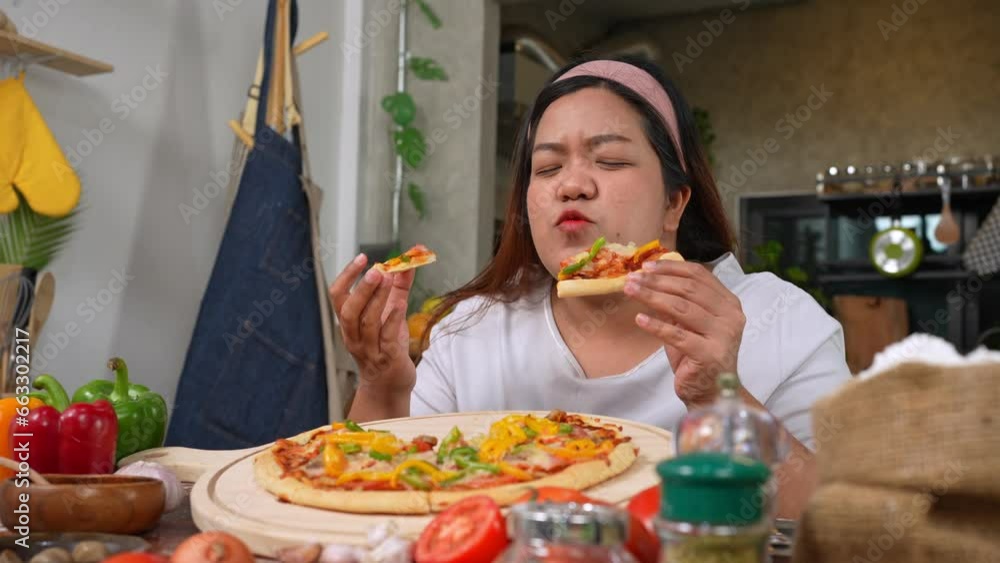 Happy Asian woman eating homemade pizza in home after baked pizza ...