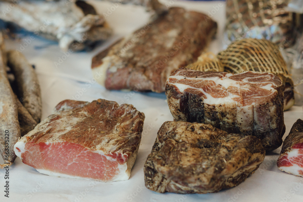 Hand made smoked meat products. Display meats, cold cuts and sausages ...