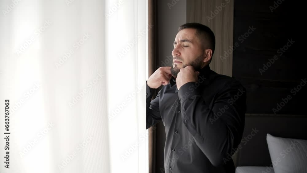 Morning of a business man. A business man gets ready for work in the ...