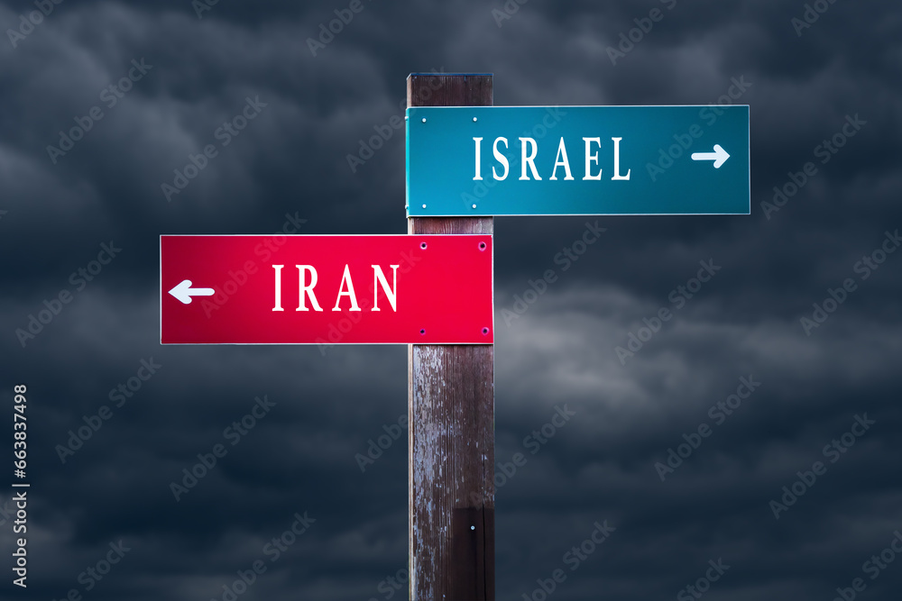 IRAN versus ISRAEL, Middle East conflict concept. Direction signs ...