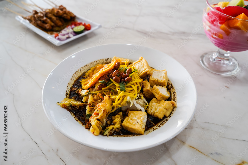 Kupat Tahu, with peanut sauce, Typical warm rujak snacks consist of ...