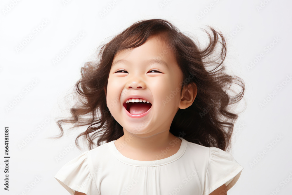 cute child model with perfect clean teeth laughing and smiling ...