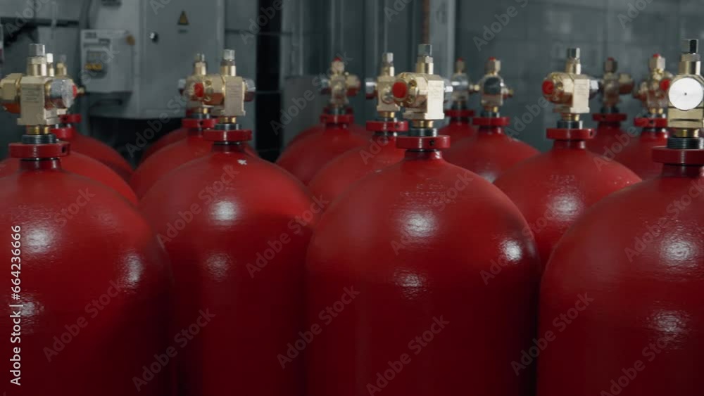 Rows of red fire extinguishers. Lots of red fire extinguishers ...