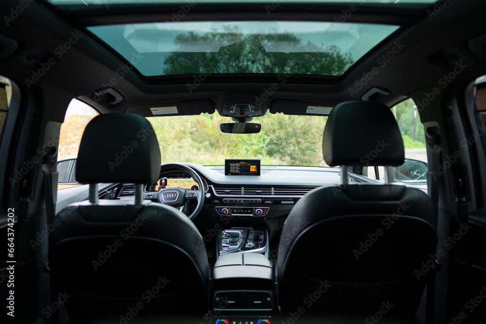 Car interior view of clean dashboard, massive windshield and panoramic ...