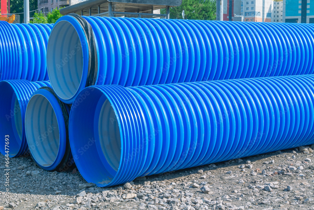 Blue plastic drain pipe with thread. Corrugated sewer pipes of large ...