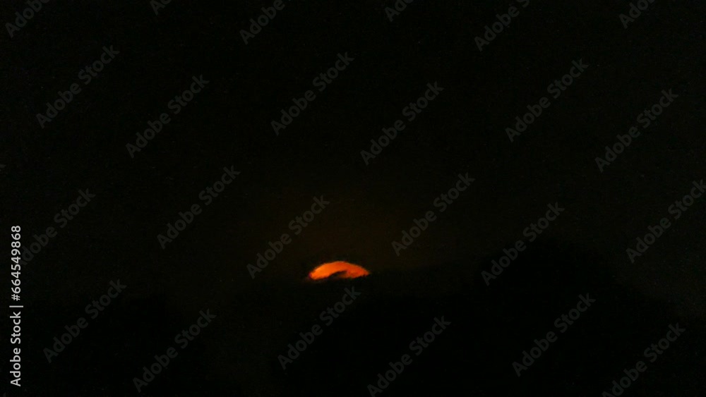 Dark night sky and red moon with Atmospheric refraction distorting ...