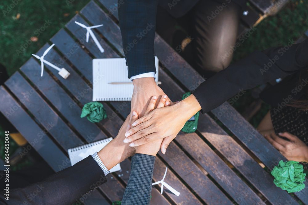 Business people join hand together as teamwork and unity, outdoor ...