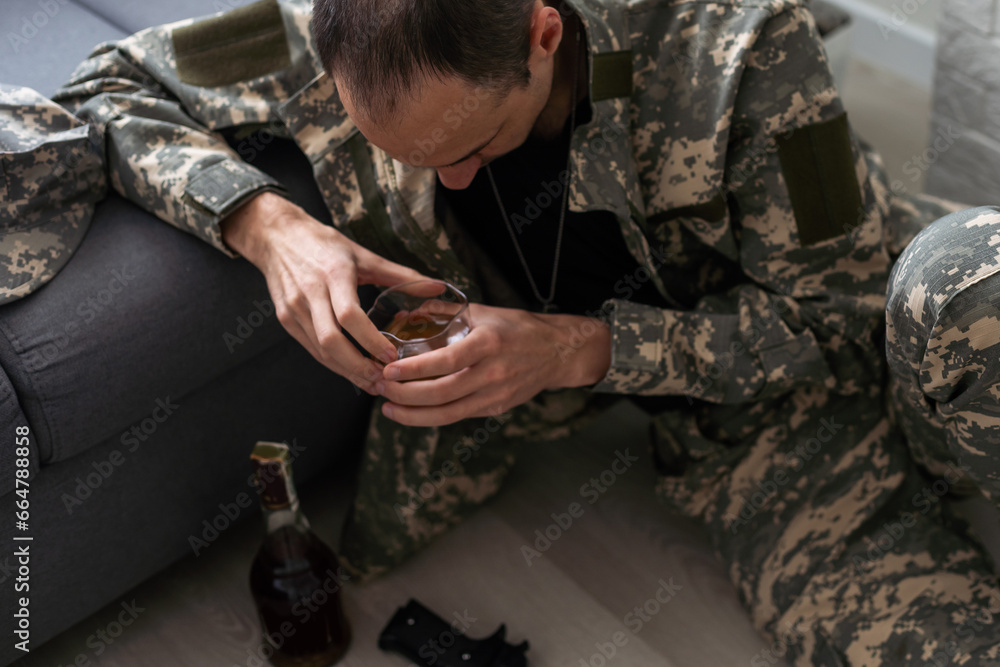 young attractive wasted and depressed addict and alcoholic man with ...