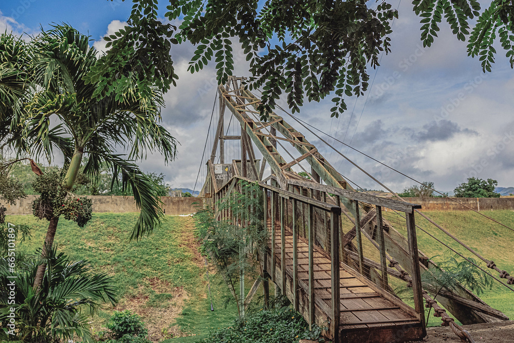 wooden hangin swing bridge in a small town in Kauai Hawaii historic ...