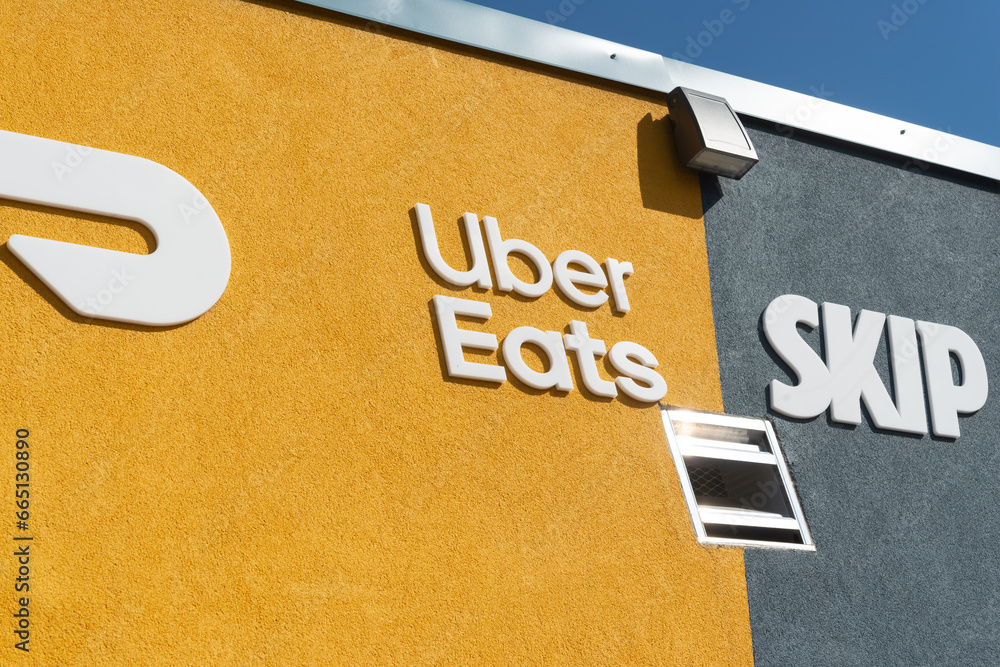 exterior building and signs of Uber Eats and SKIP outside Junction Food ...