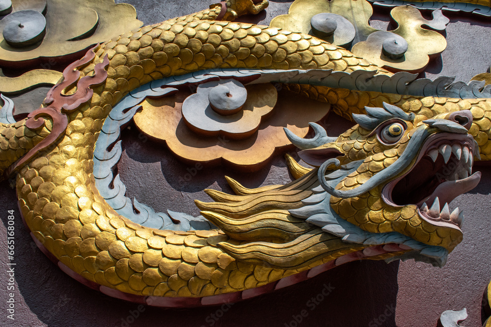 Dakshinkali, Nepal: details of a golden snake, part of the ornaments of ...
