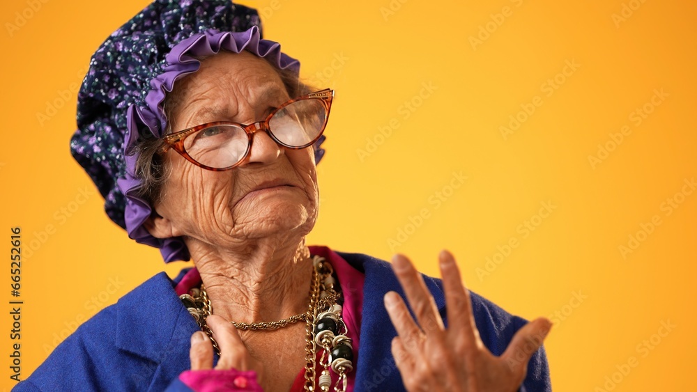 Closeup of angry, scared elderly senior old funny crazy woman with ...