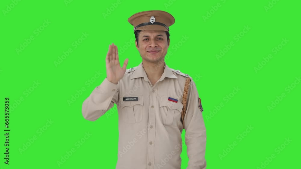 Happy Indian police officer saying hello Green screen Stock Video ...