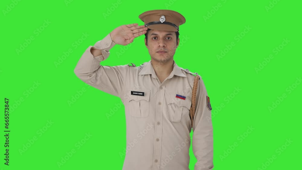 Proud Indian police officer saluting Green screen Stock Video | Adobe Stock