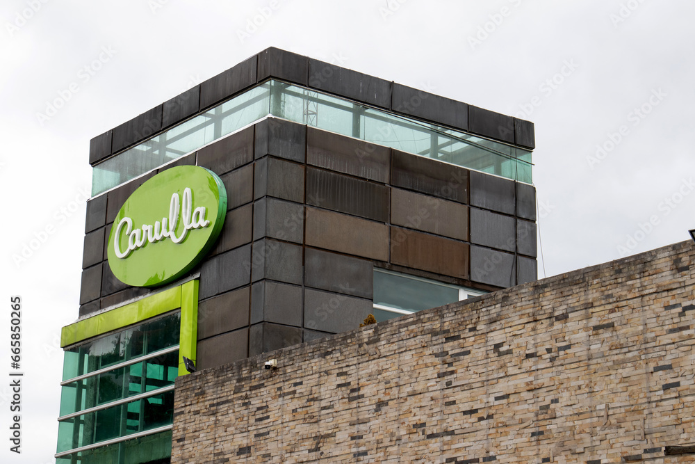 Bogota, Colombia - October 20th 2023. Facade of the Carulla Supermarket ...