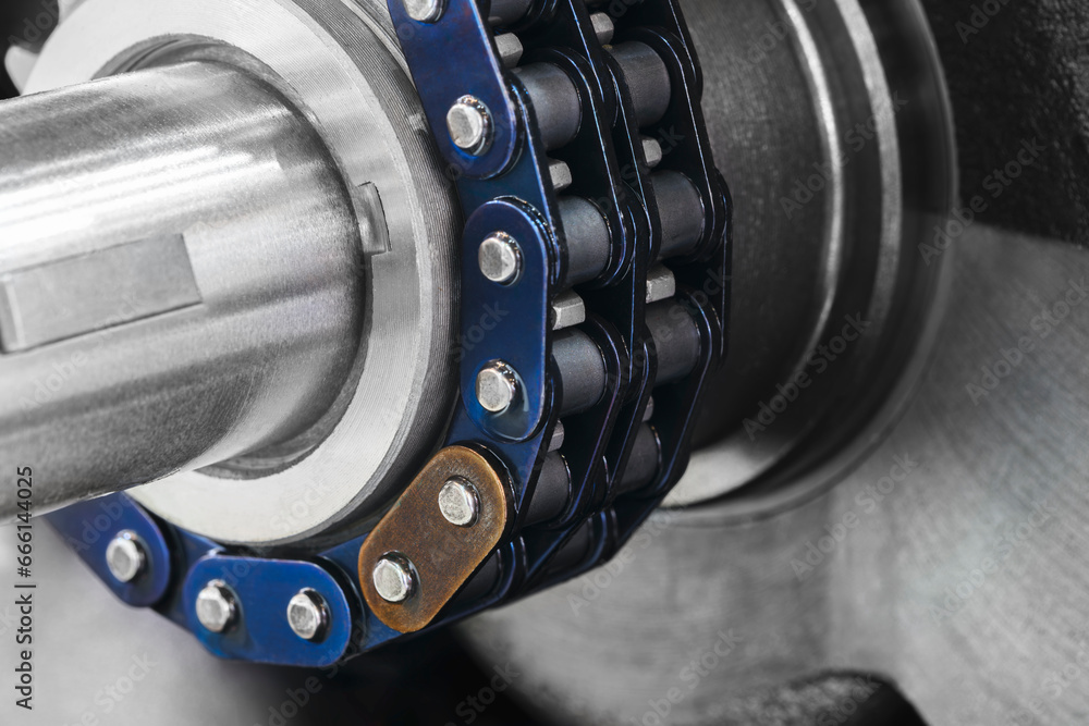 new car timing chain on a disassembled engine in a car workshop. Timing ...