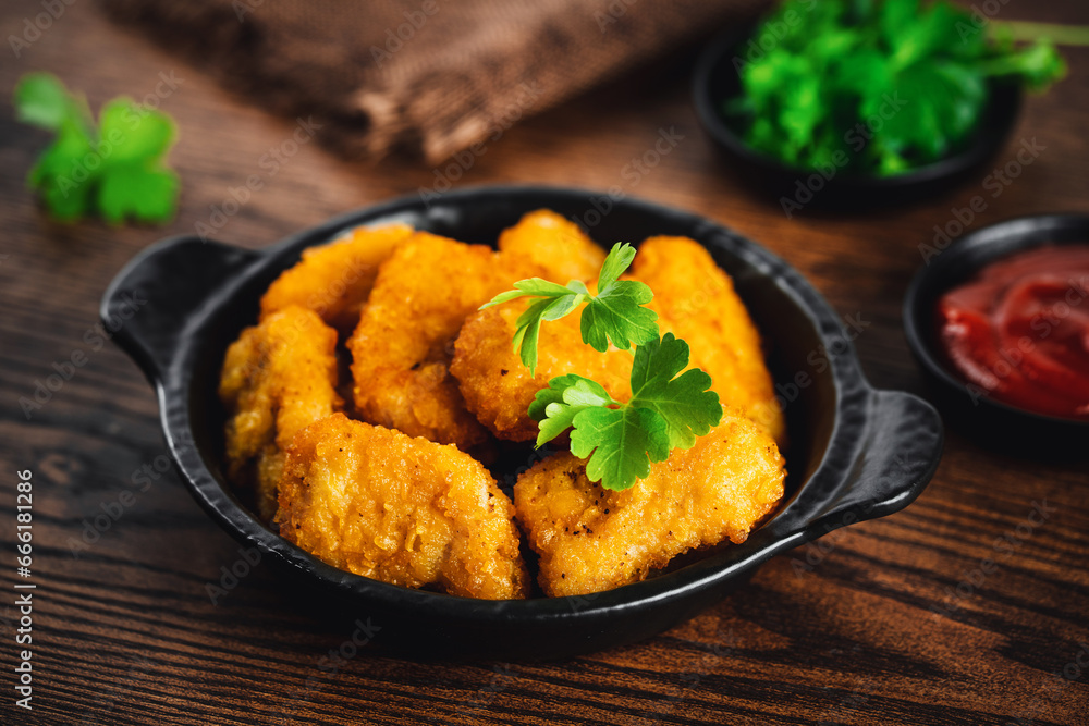 Breaded chicken nuggets. Semifinished chicken nuggets from chicken ...