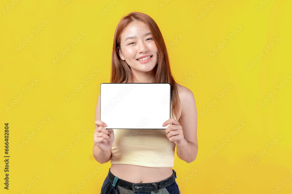 beautiful Asian young woman showing smart phone , tablet phone computer ...