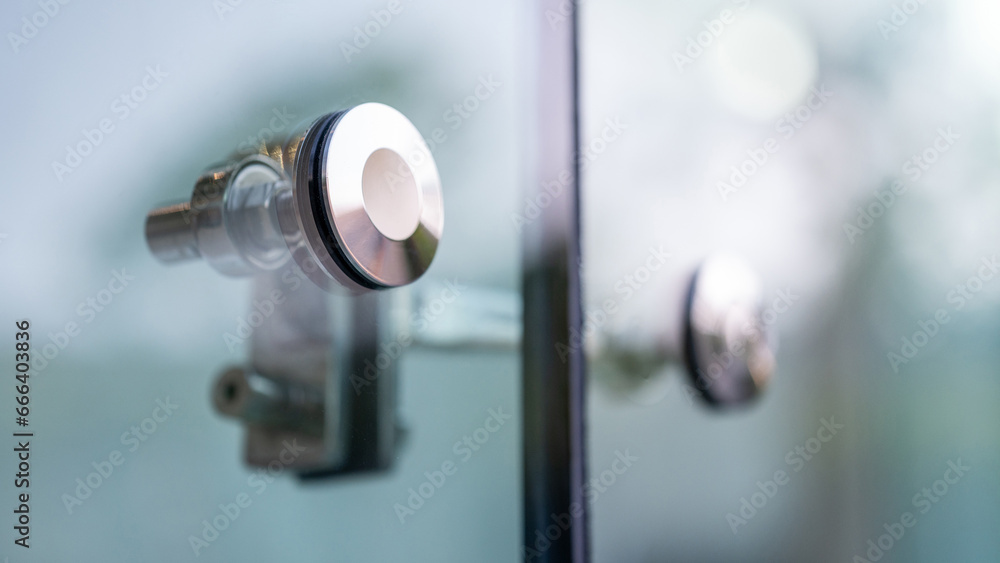 Metal fasteners element of spider glass curtain wall system. Detail of ...