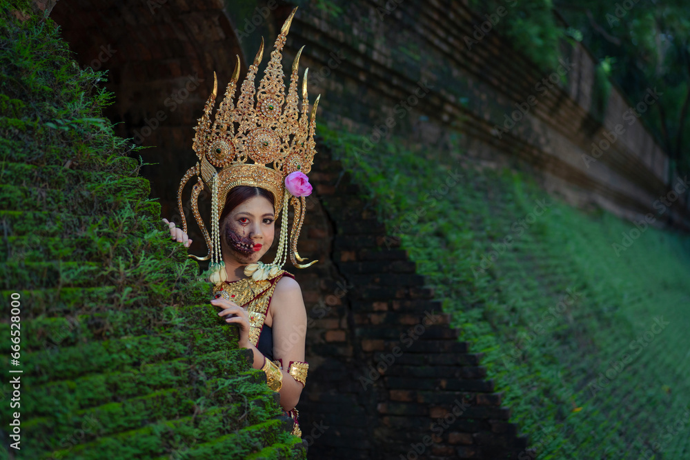 Halloween a scared horrible pretty Asian woman wearing an ancient ...