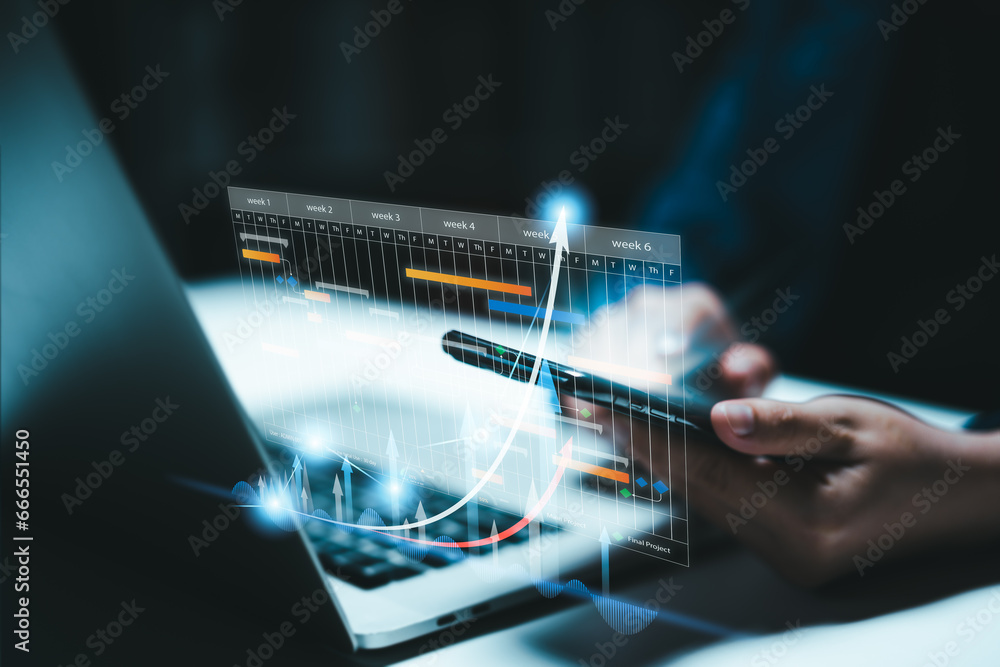 An analyst uses a computer and dashboard for data business analysis and ...