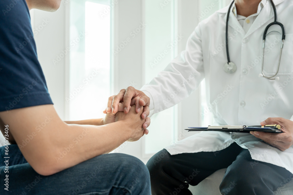 psychiatrist hold hand support each while discussing family issues ...