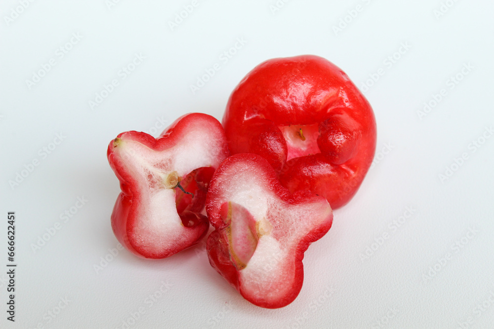 Small and red colored fruit of Syzygium aqueum. Also known as water ...