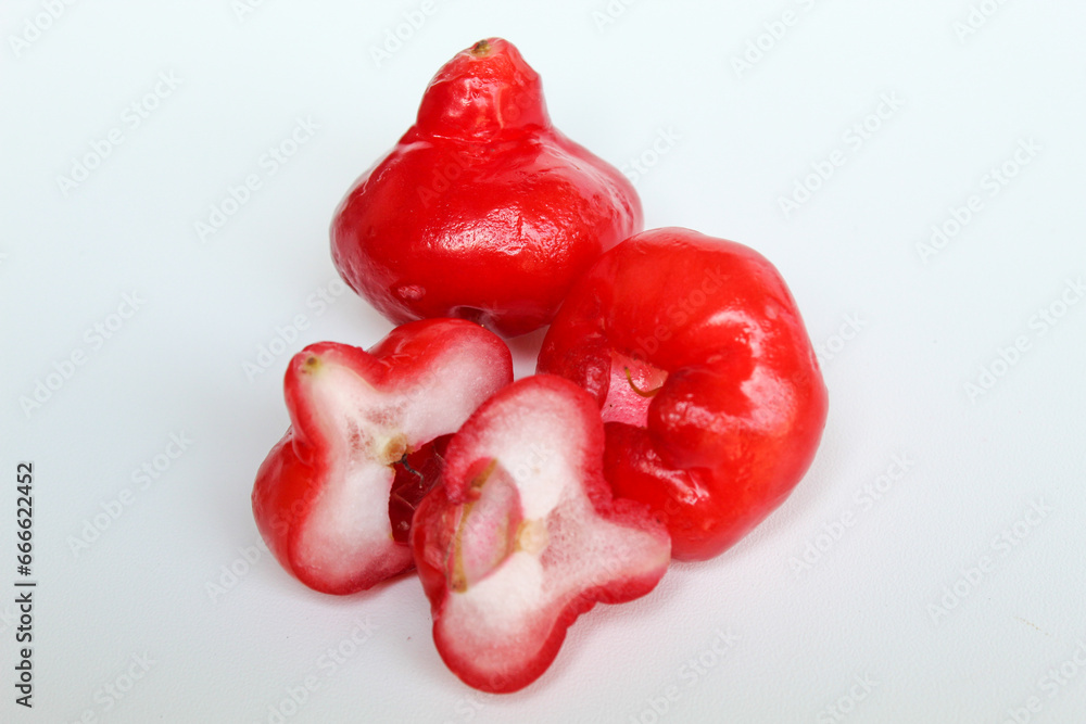 Small and red colored fruit of Syzygium aqueum. Also known as water ...