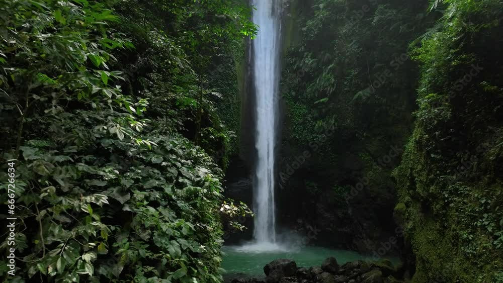 Drone shoot. Waterfall hidden in tropical rainforest jungle, falling ...