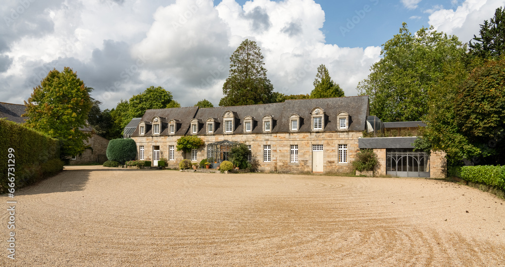 converted accommodation stables in beige stone at Chateau de Kergrist ...