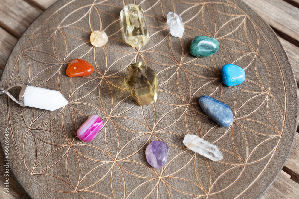Gemstones minerals over life flower chart with sinshine. Magic healing ...