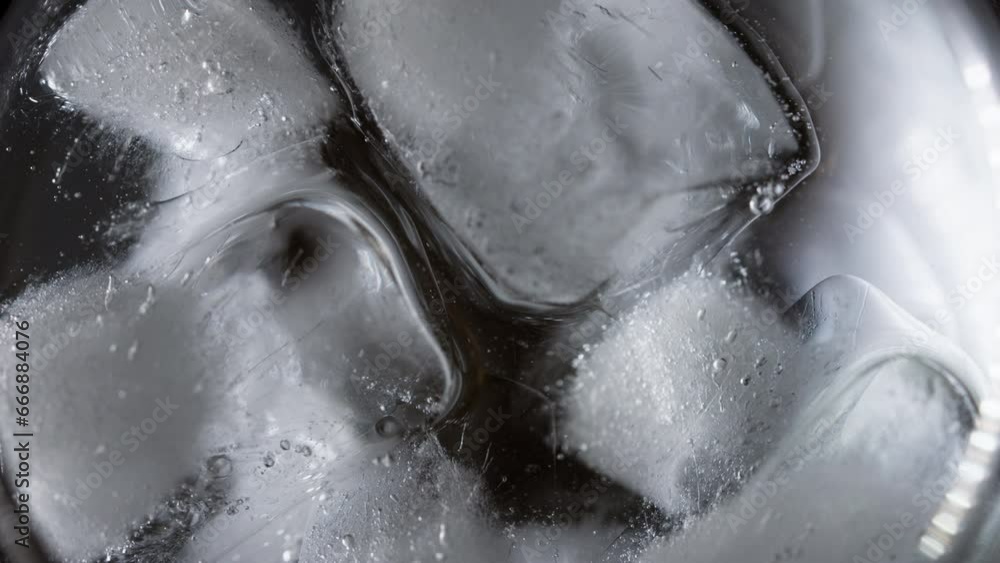 Top view close-up of an ice cube in water a captivating frozen moment ...
