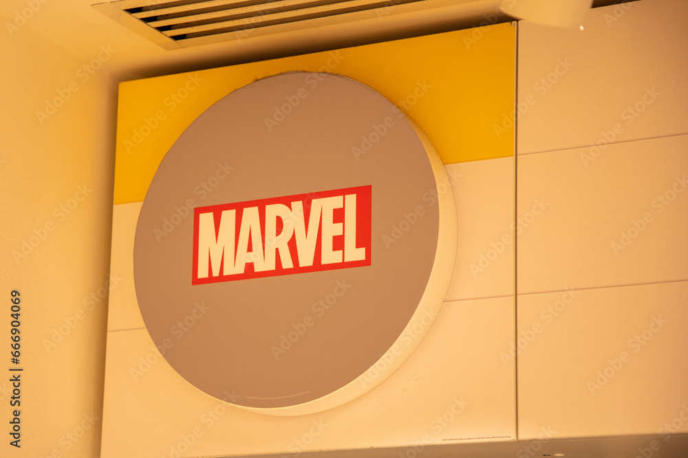 marvel comics shop logo brand and text sign front wall boutique library ...