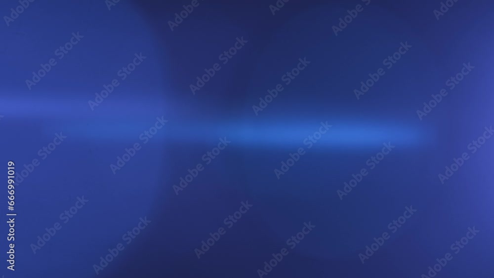Abstract overlay with spot blue light transition, lens flare flashes on ...