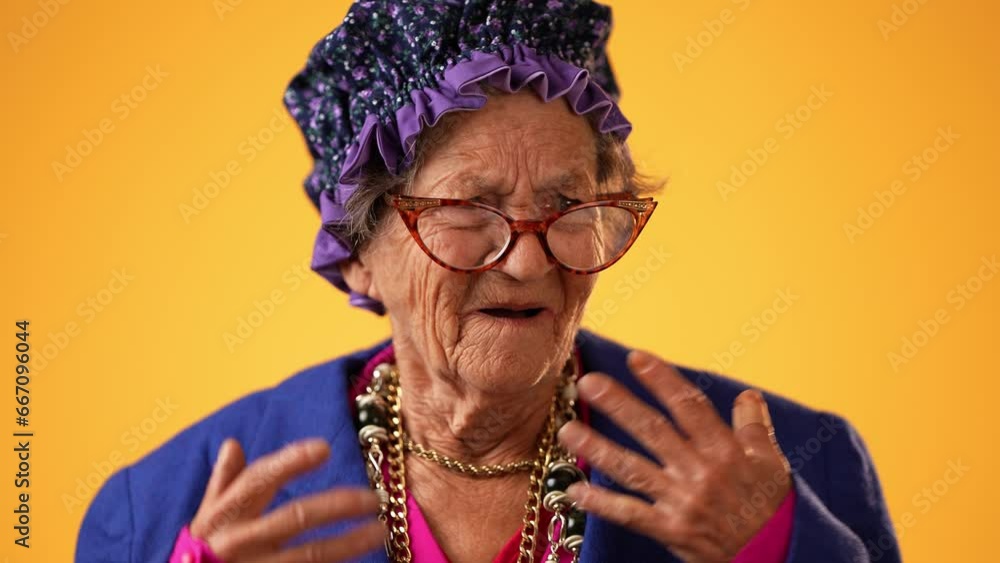 Closeup of angry, scared elderly senior old funny crazy woman with ...