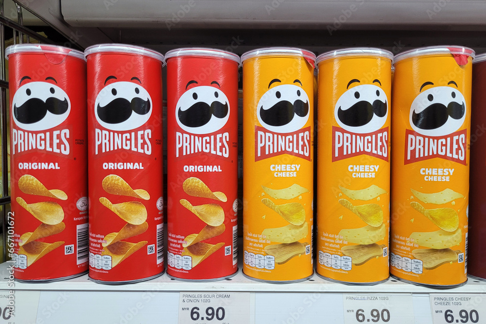 PENANG, MALAYSIA - 6 OCT 2023: Row of Pringles Snack on store shelf in ...