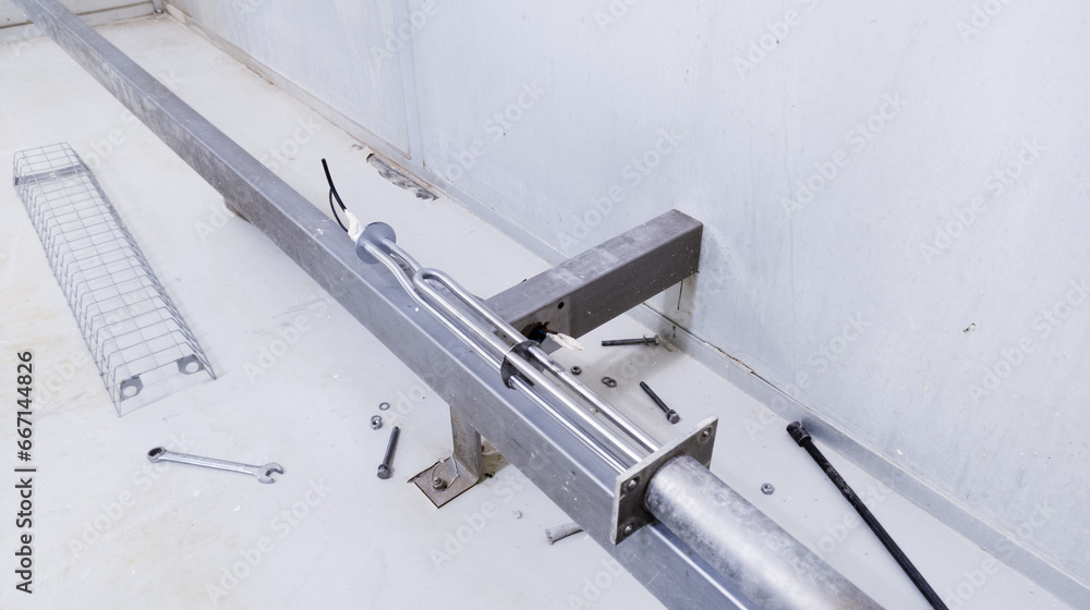 Repair and replacement of heating components in modern chicken hatching ...