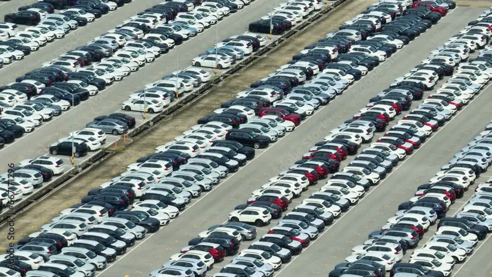 Bird's-eye view unveils an array of electric vehicles in a sprawling ...