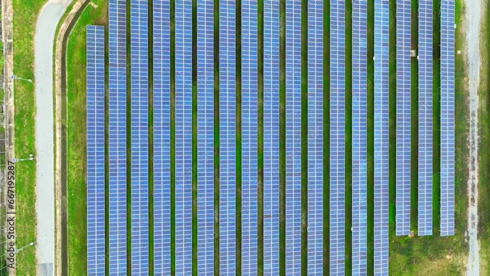 Solar array harmoniously integrated into the landscape, seen from above ...
