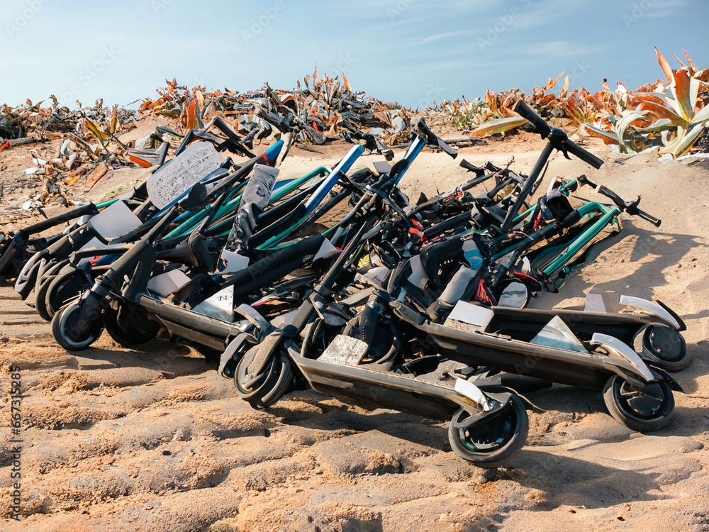 Discarded e-scooters in a desert landfill, symbolizing the future of ...