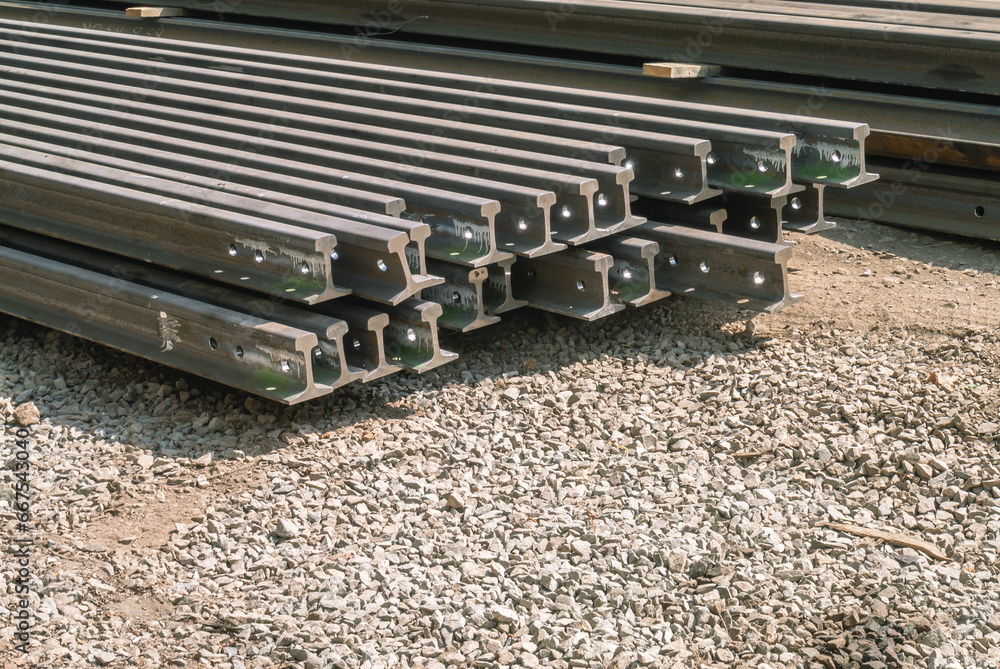 Steel rails of special cross-section laid on sleepers form the path ...