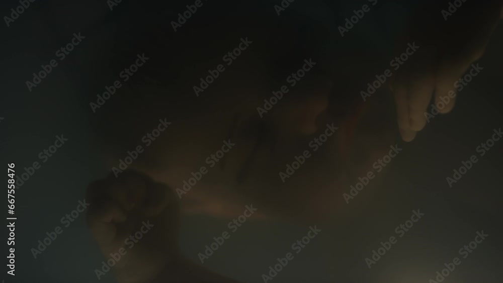 Vidéo Stock Macro closeup of lab growing sleeping fetus in horizontal ...