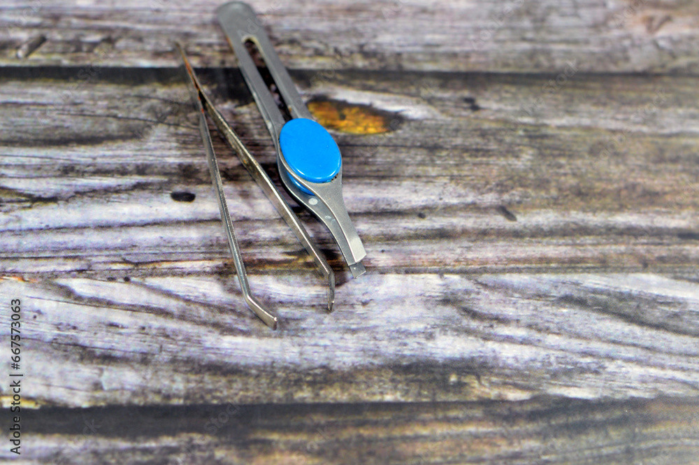 Tweezers, small hand tools used for grasping objects too small to be ...