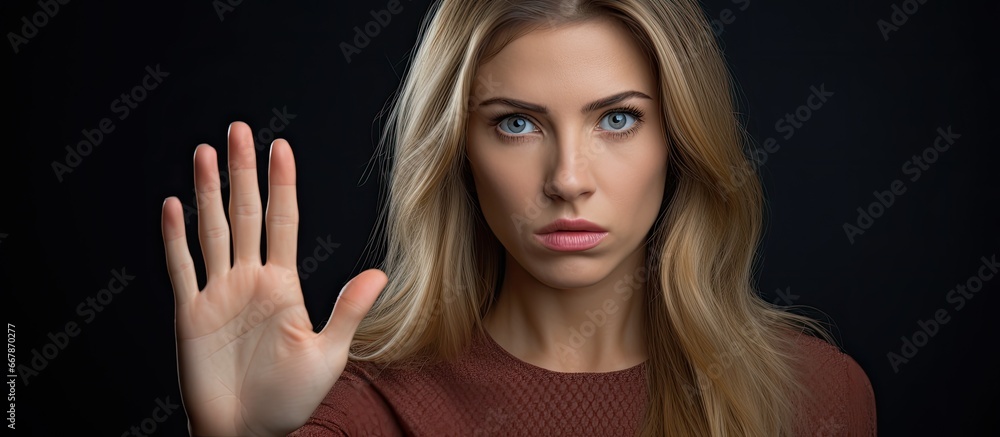 Terrified woman making a stop gesture due to a frightful sight Stock ...
